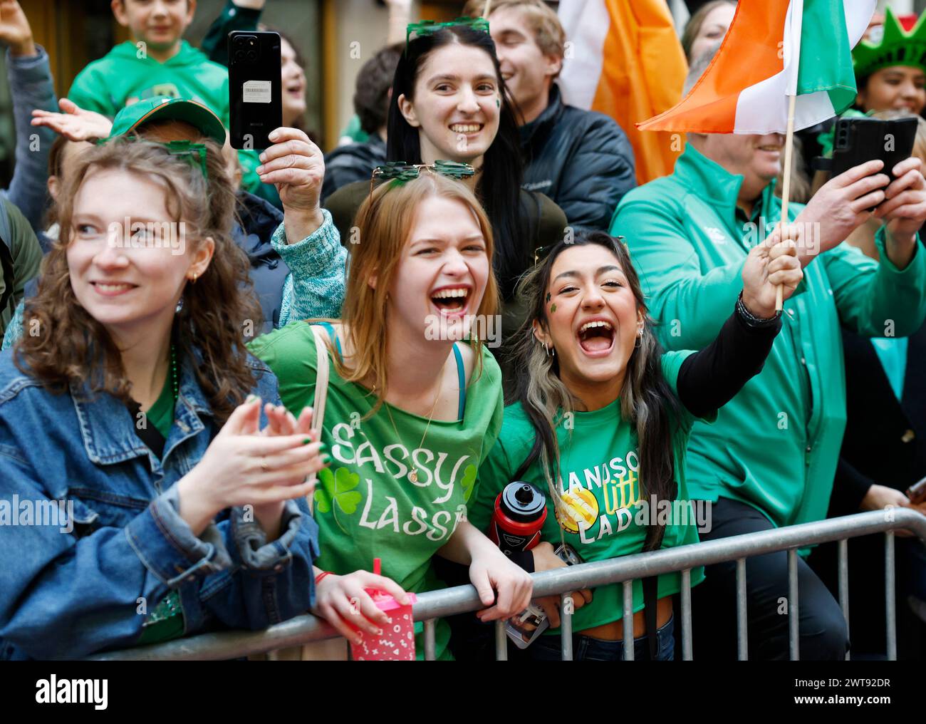 New York, United States. 15th Mar, 2024. Parade goers cheer as ...