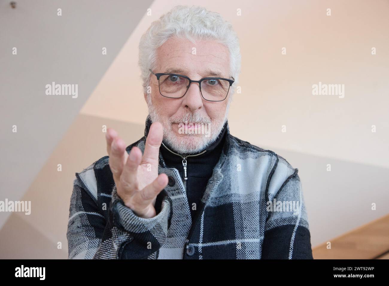Hamburg, Germany. 16th Mar, 2024. André Heller, Austrian multimedia artist, stands in the foyer ...