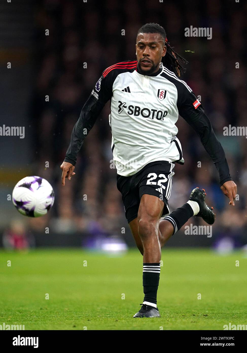 Fulham's Alex Iwobi in action during the Premier League match at Craven ...