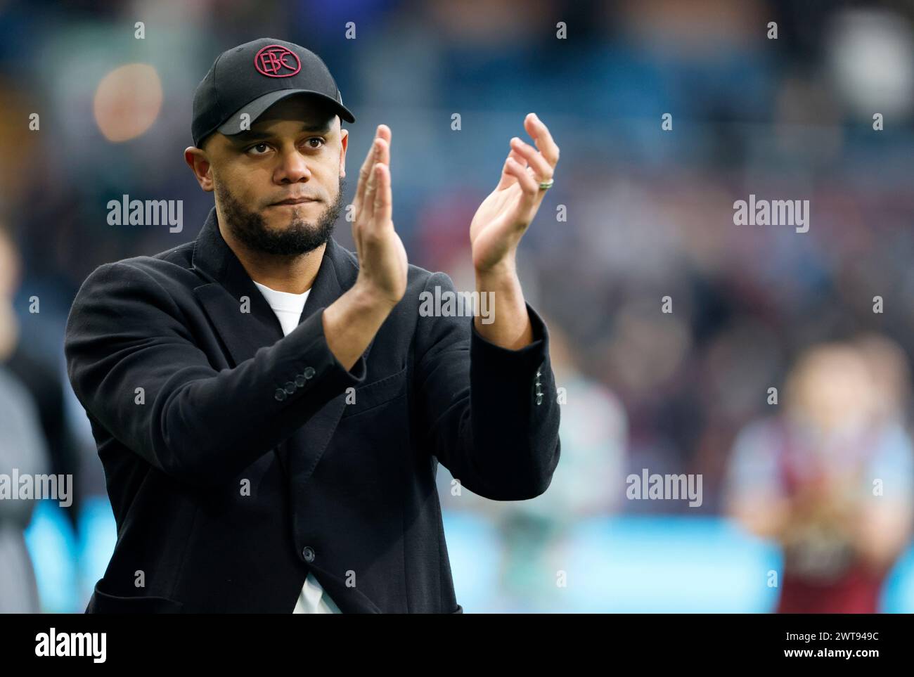 Burnley manager Vincent Kompany applauds the fans after the Premier ...