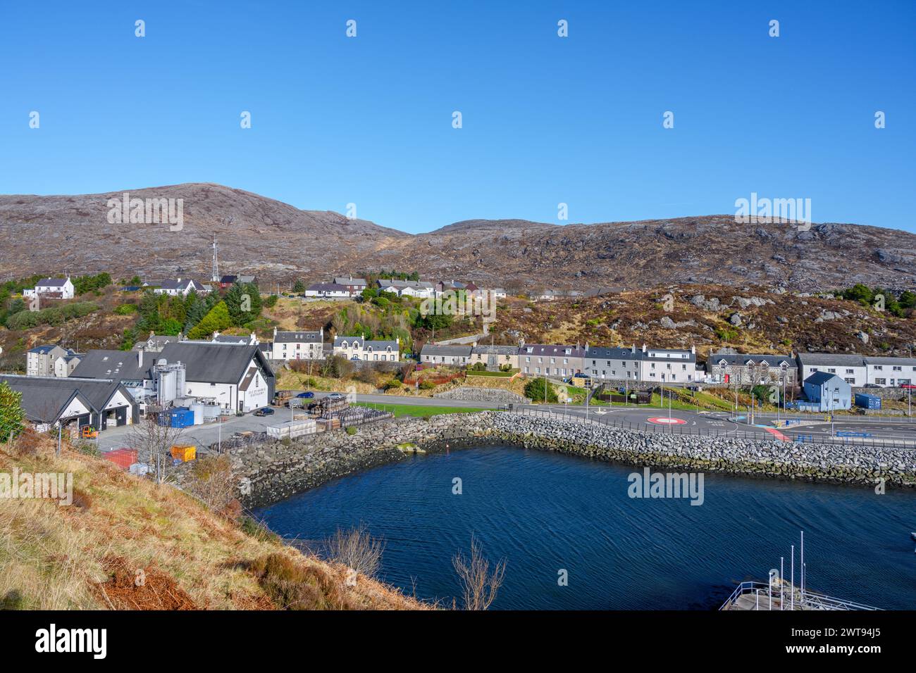 View over the port of Tarber and the Isle of Harris Distillery, Isle of ...