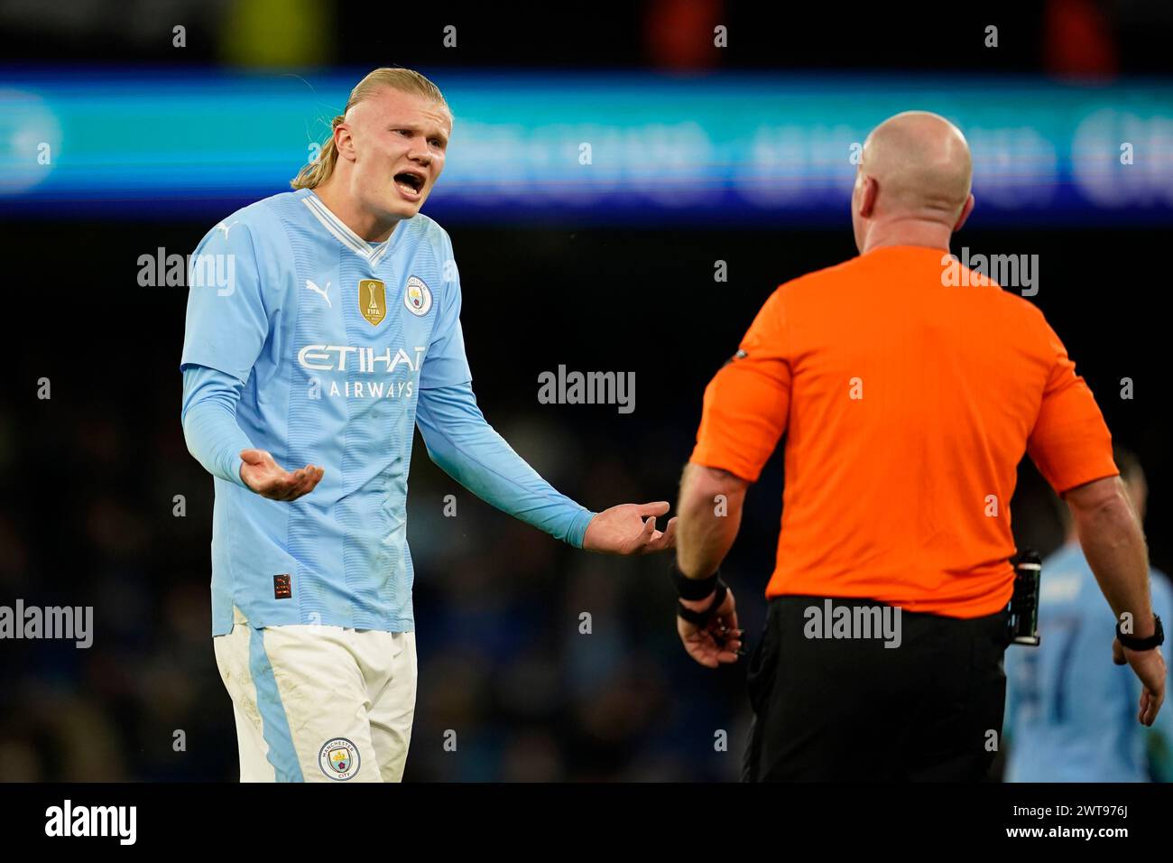 Manchester City's Erling Haaland, left, talks with referee during the ...
