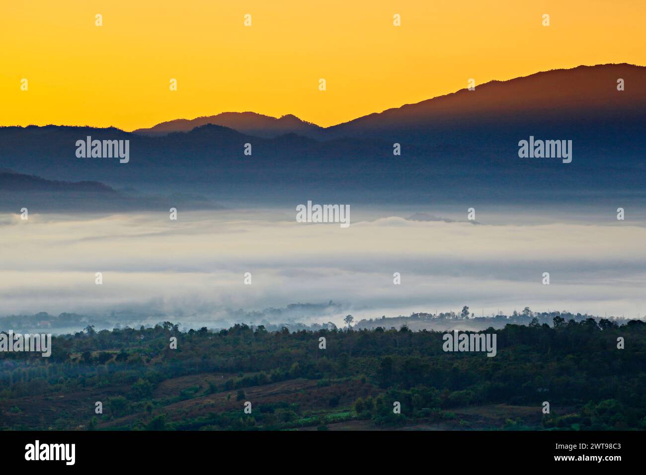 Sunrise and sea of clouds over Pai District, Mae Hong Son Province ...