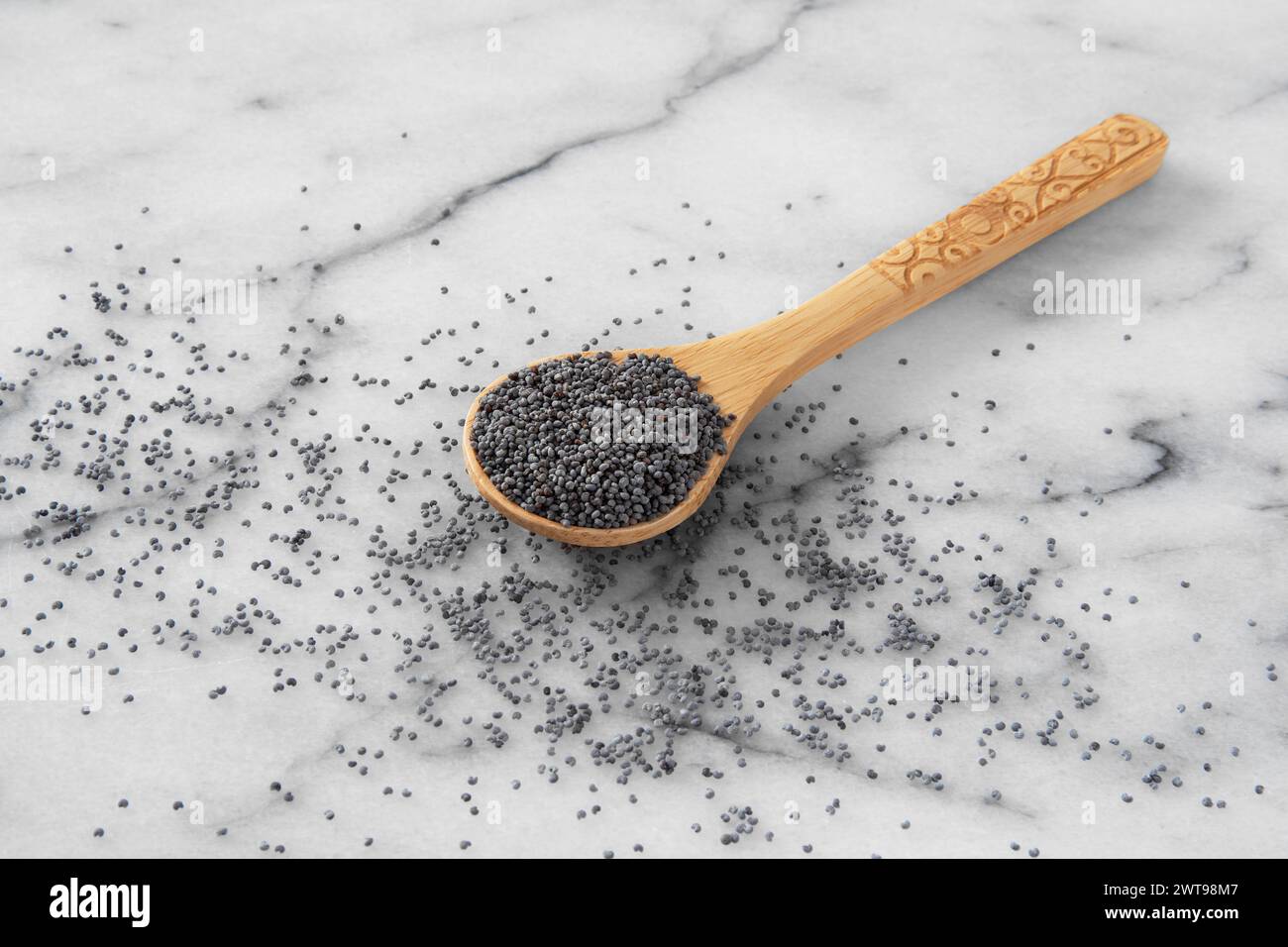 Close-up of blue poppy seeds Stock Photo - Alamy