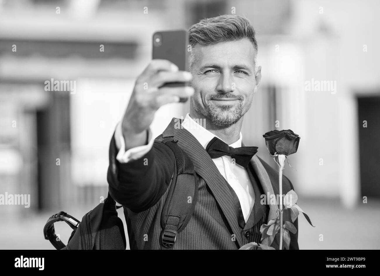 Selfie Time Man In Tuxedo Making Selfie Man In Bowtie Outdoor Happy Man With Red Rose Taking