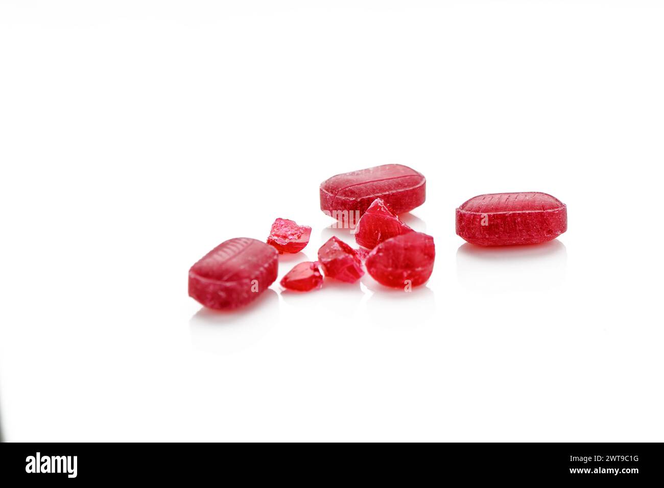 red fruit hard candy isolated on white. lollipop, candy, sweetmeat ...