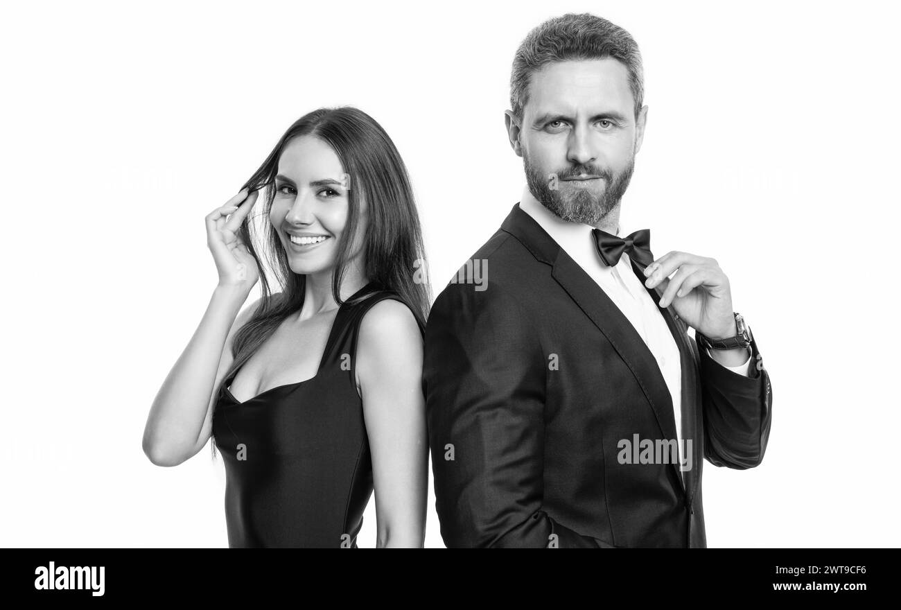 happy couple in formal tuxedo. studio shot of formal tuxedo couple ...