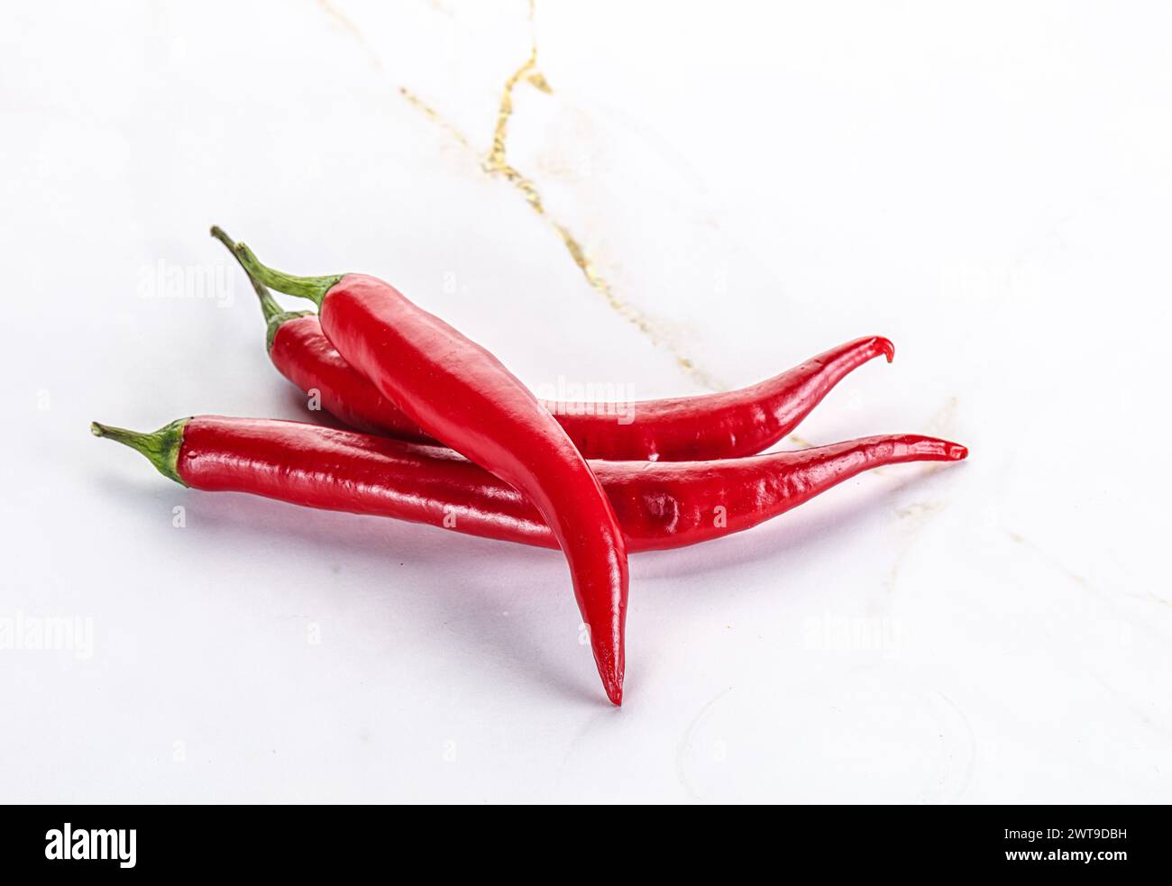 Hot and spicy chili pepper heap Stock Photo - Alamy