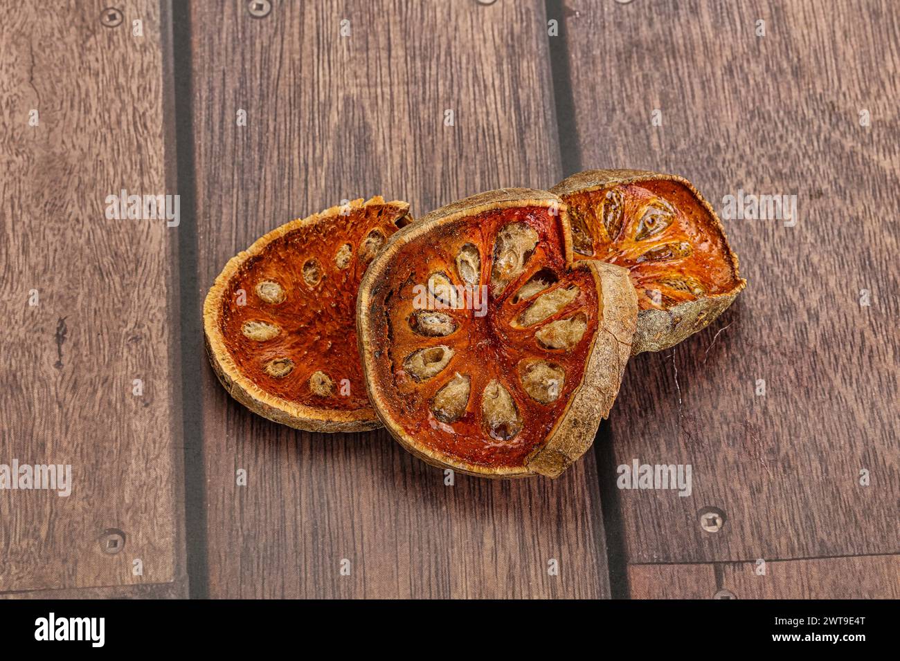 Thai cuisine - dry bael fruit for drinks Stock Photo - Alamy