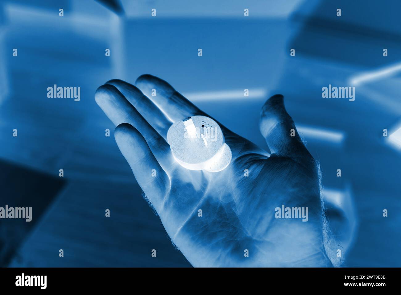 A hand cradles a glowing Type I electrical outlet, symbolizing control ...