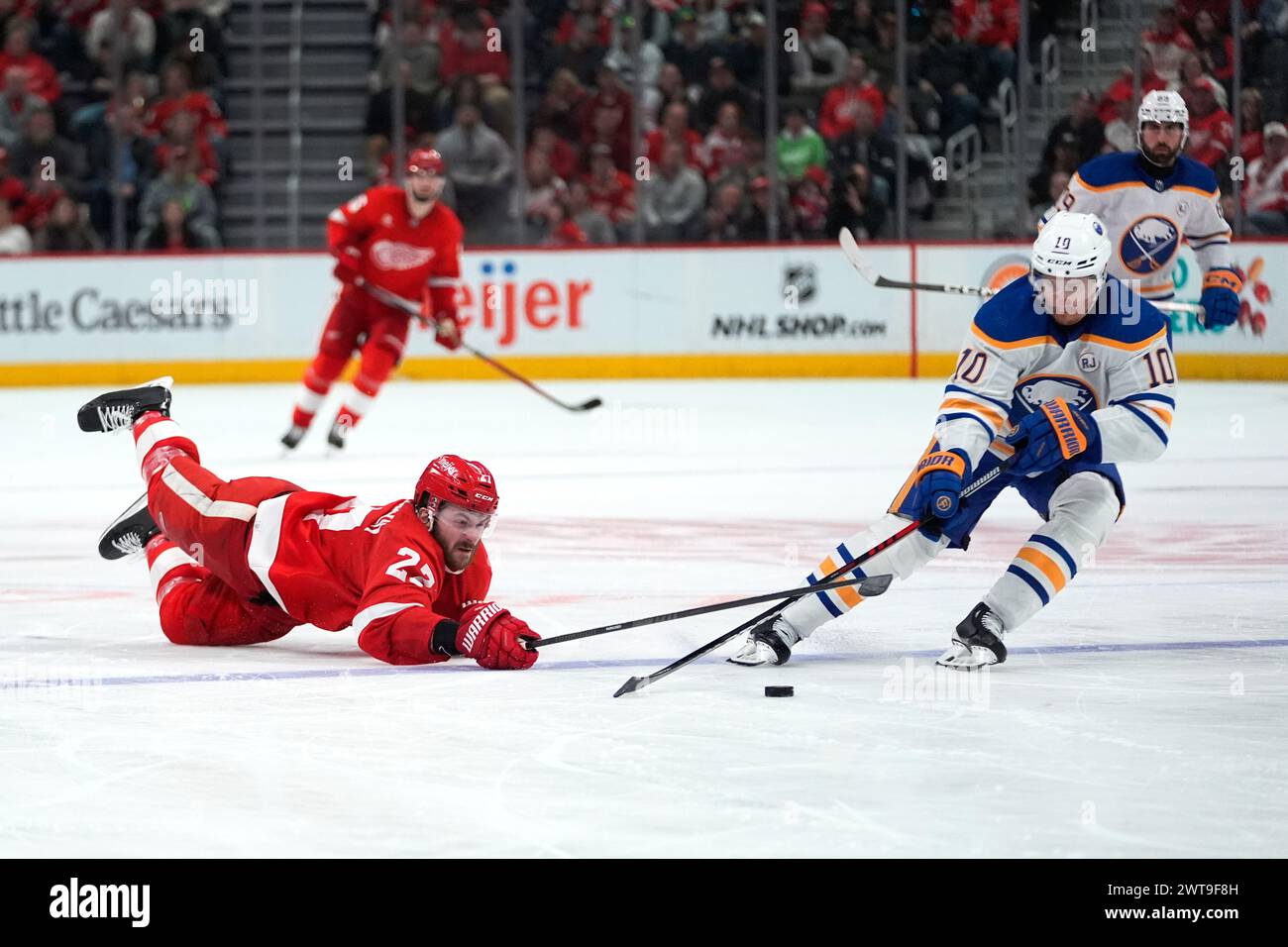 Detroit Red Wings center Michael Rasmussen (27) dives to clear the puck ...