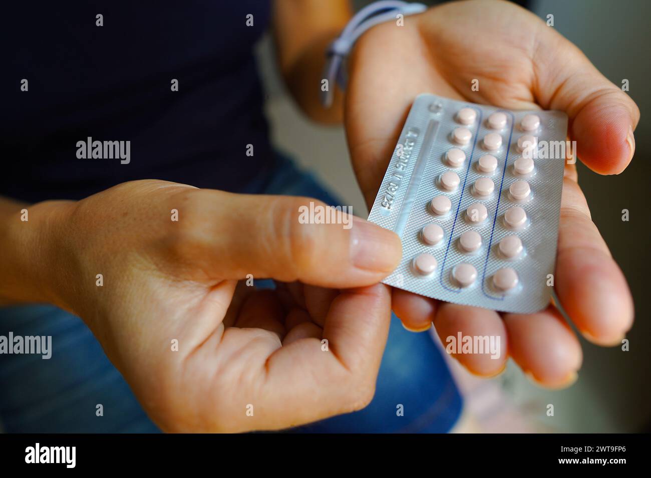 A woman seen holding birth control pills. The first over-the-counter ...