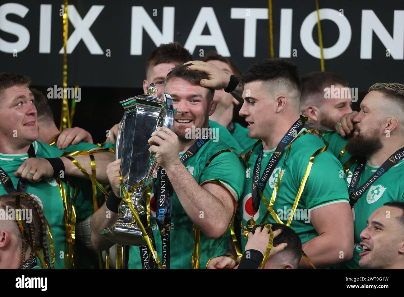 Ireland’s captain Peter O’Mahony lifts the Guinness Six Nations trophy ...