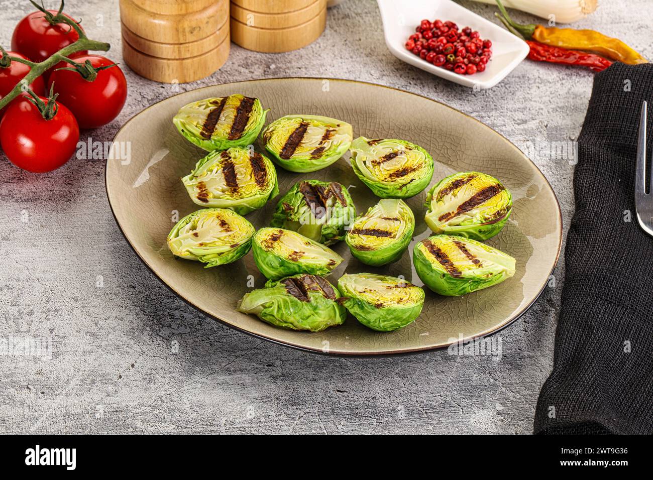 Vegan cuisine Grilled green brussel sprout cabbage Stock Photo - Alamy