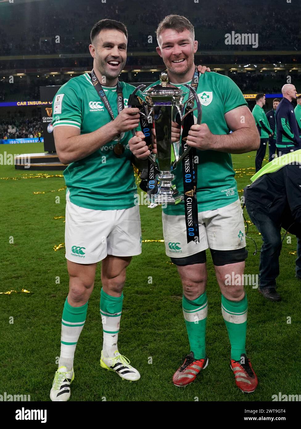 Ireland's Conor Murray (left) and Peter O'Mahony with the trophy after ...