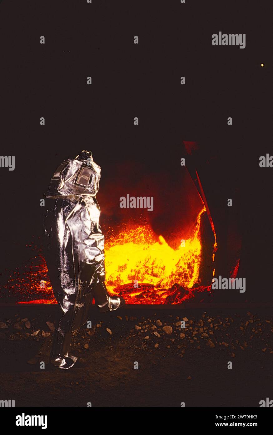 Steelworker, pouring slag (molten metal), US Steel, Edgar Thomson Plant ...
