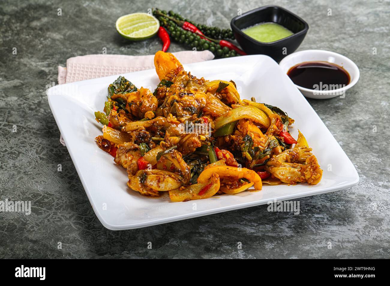 Vietnamese cuisine - fried frog with vegetables and spices Stock Photo ...