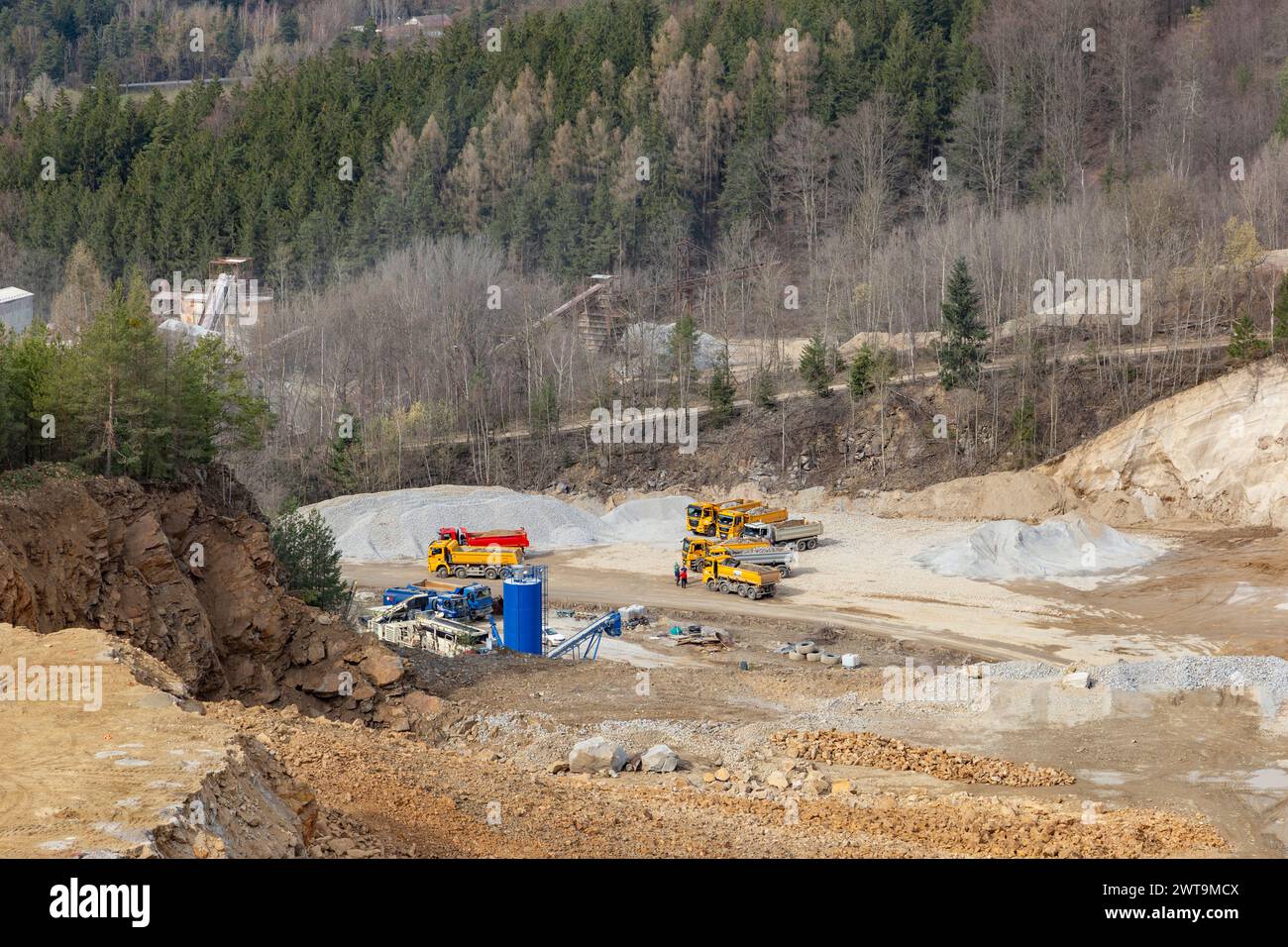 Mining machines. Stone quarry extraction Stock Photo - Alamy