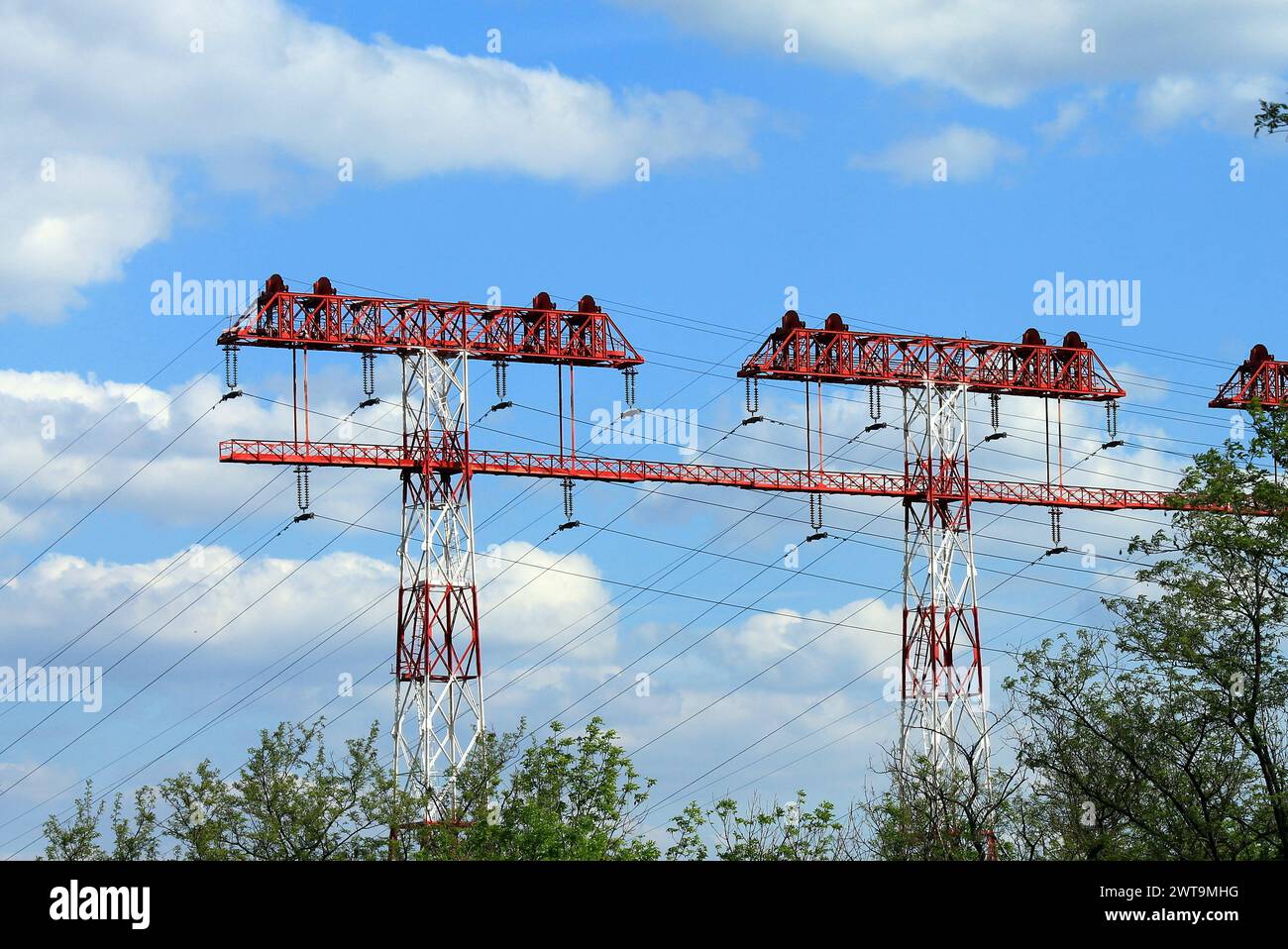 Industrial landscape. High voltage power transmission line mast. Steel ...