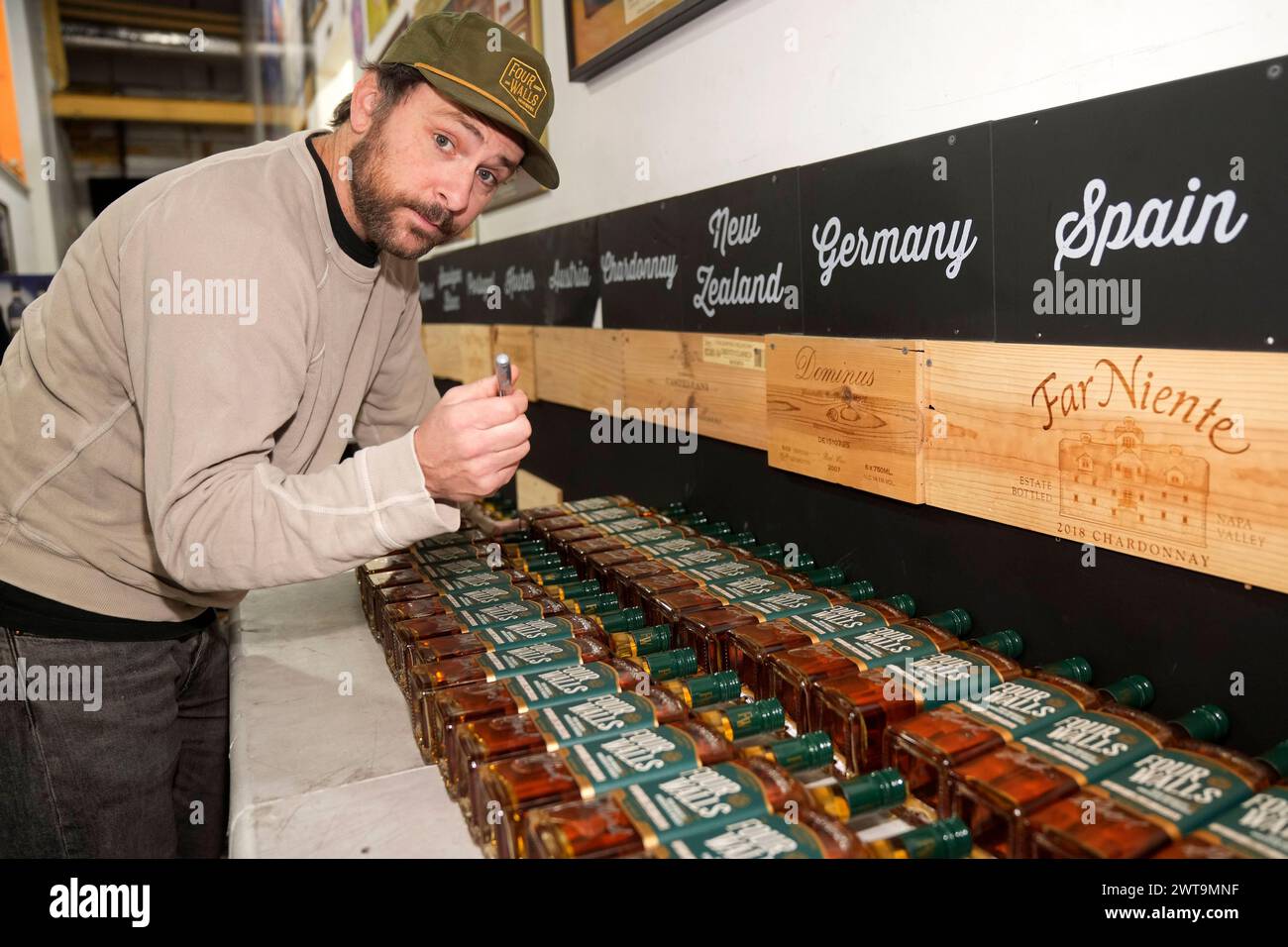 Charlie Day signs bottles of his Four Walls whiskey at Buy Rite on ...
