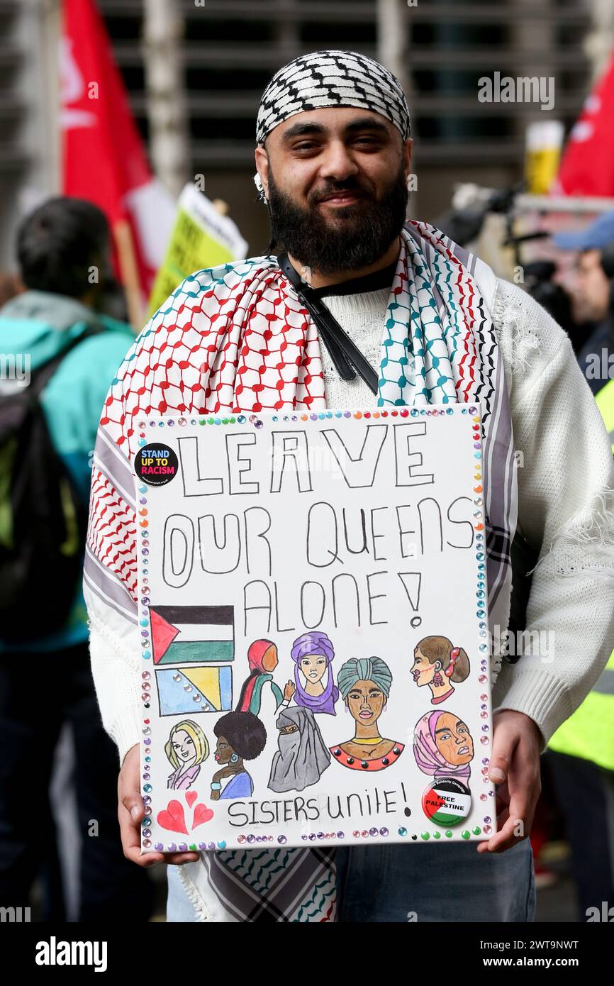 London, UK. 16th Mar, 2024. A protester holds a placard outside Home ...