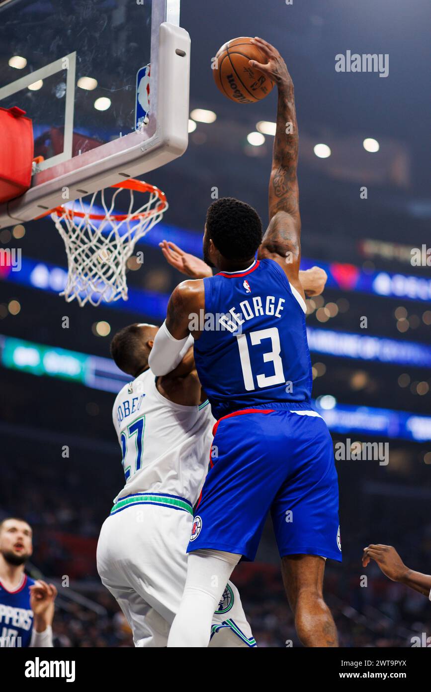 LOS ANGELES, CA - MARCH 12: LA Clippers forward Paul George (13) dunks ...