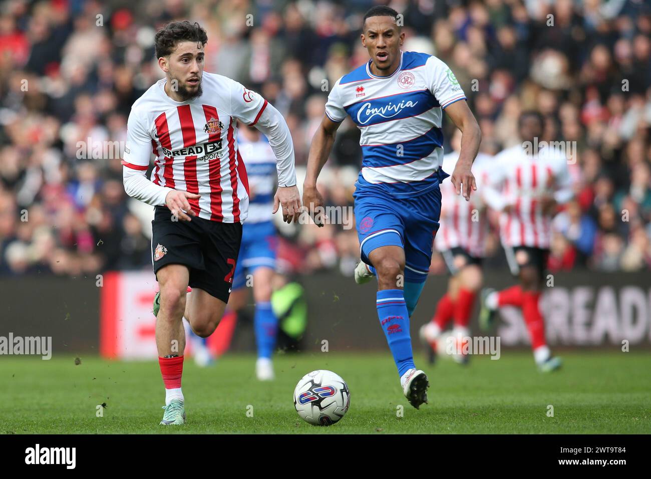Sunderland's Adil Aouchiche runs with the ball as QPR's Isaac Hayden ...