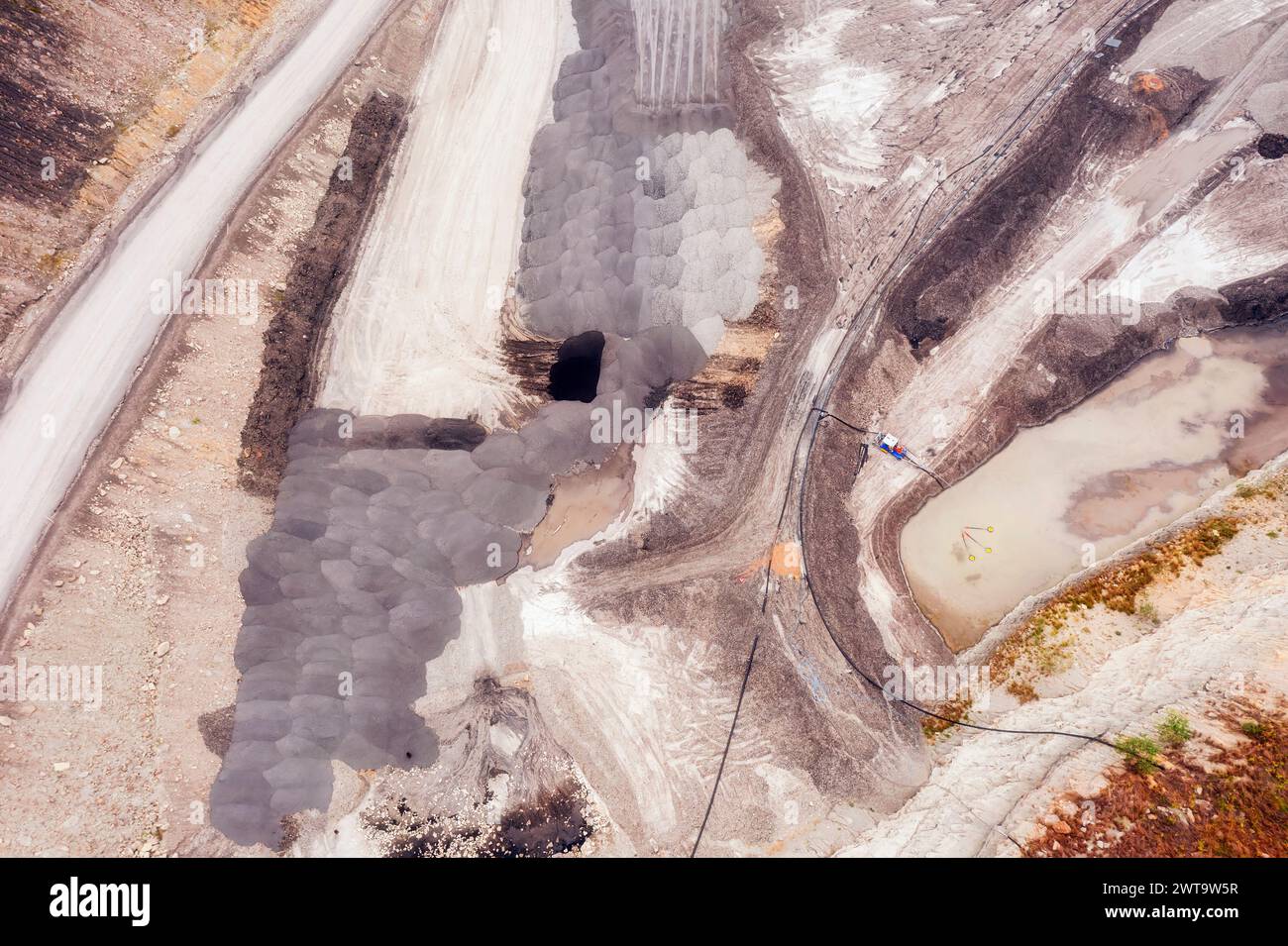 Bottom of the open pit black coal mine in Hunter Valley region of ...