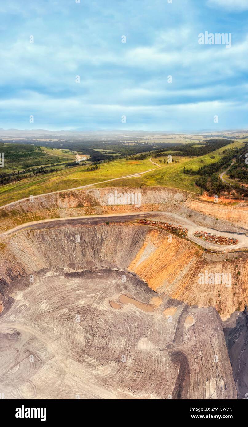 Deep open pit black coal mine in Hunter Valley of Australia - aerial ...