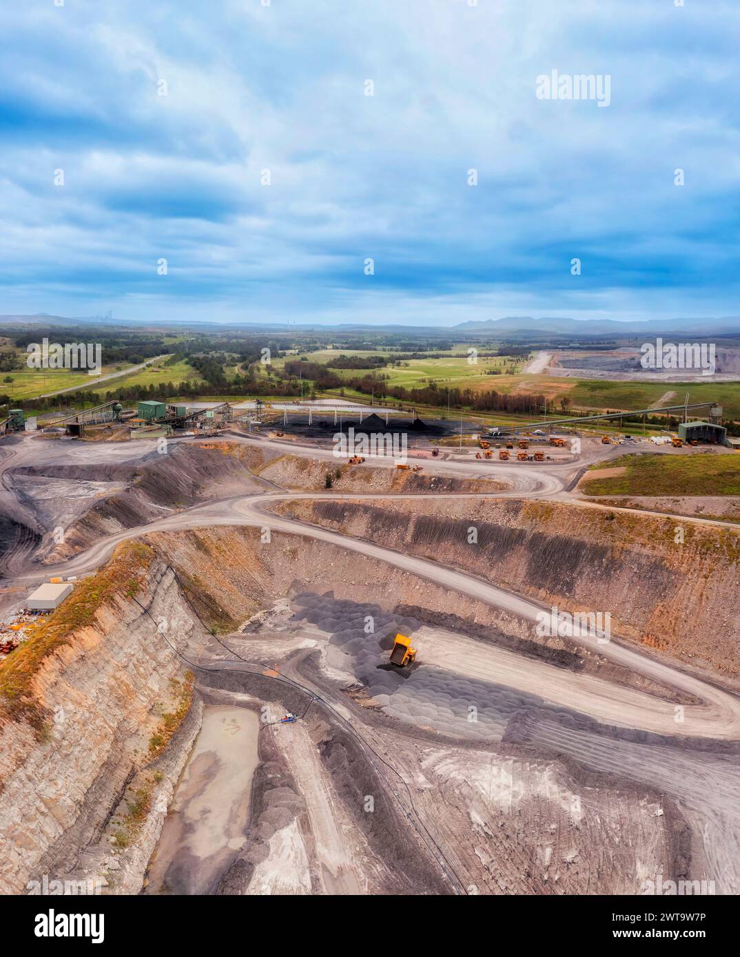 Bottom of open pit black coal mine near Singleton in Hunter valley of ...
