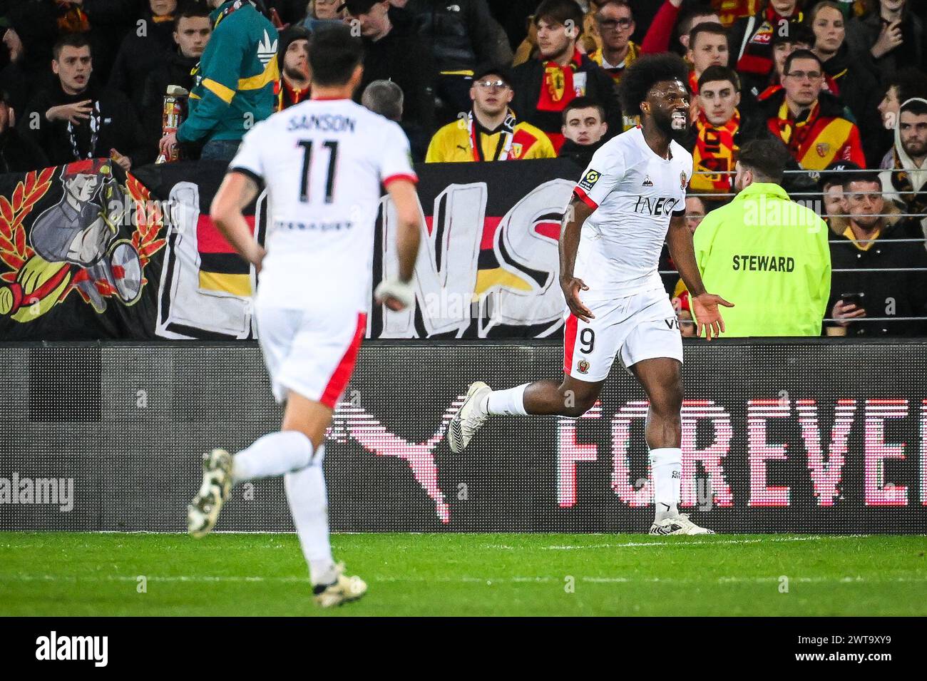 Lens, France. 16th Mar, 2024. Terem MOFFI of Nice celebrate his goal ...