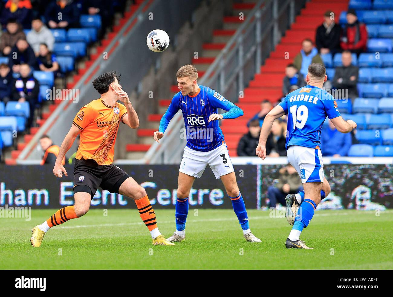 Mark Kitching of Oldham Athletic Association Football Club clears from ...