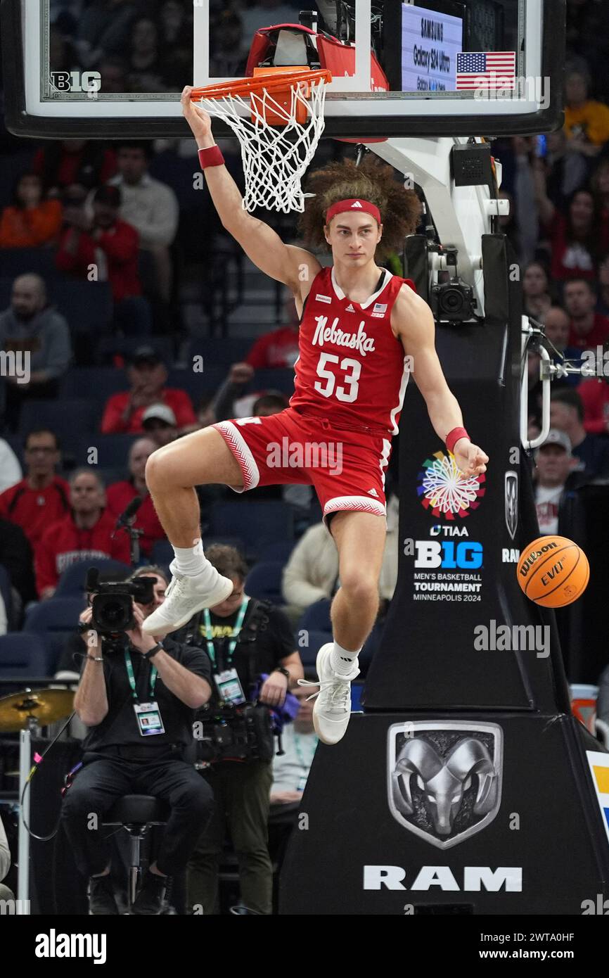 Nebraska forward Josiah Allick (53) hangs on the rim after a dunk ...