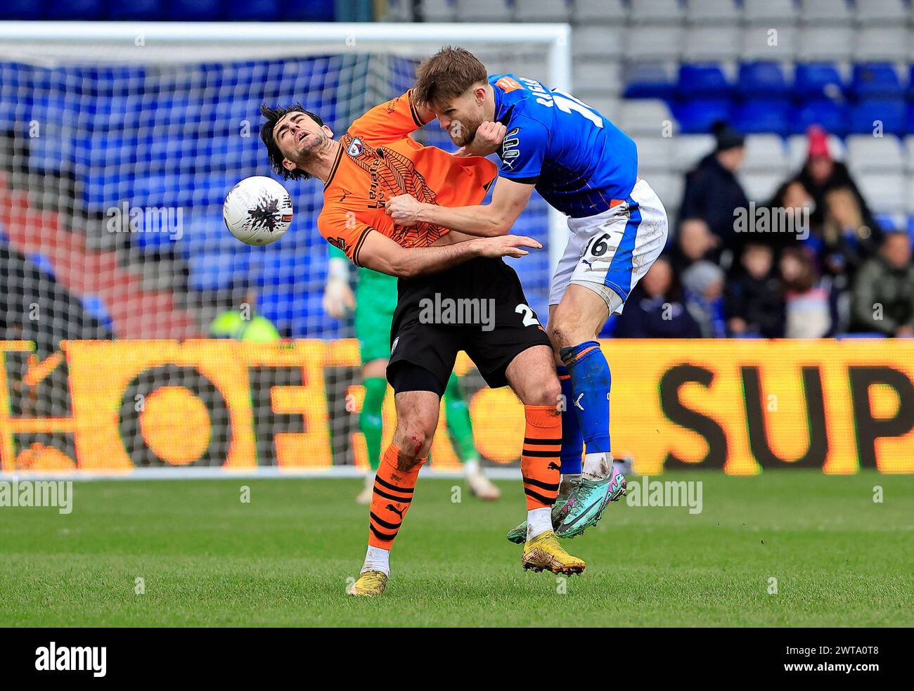 Charlie Raglan of Oldham Athletic Association Football Club is tussling ...