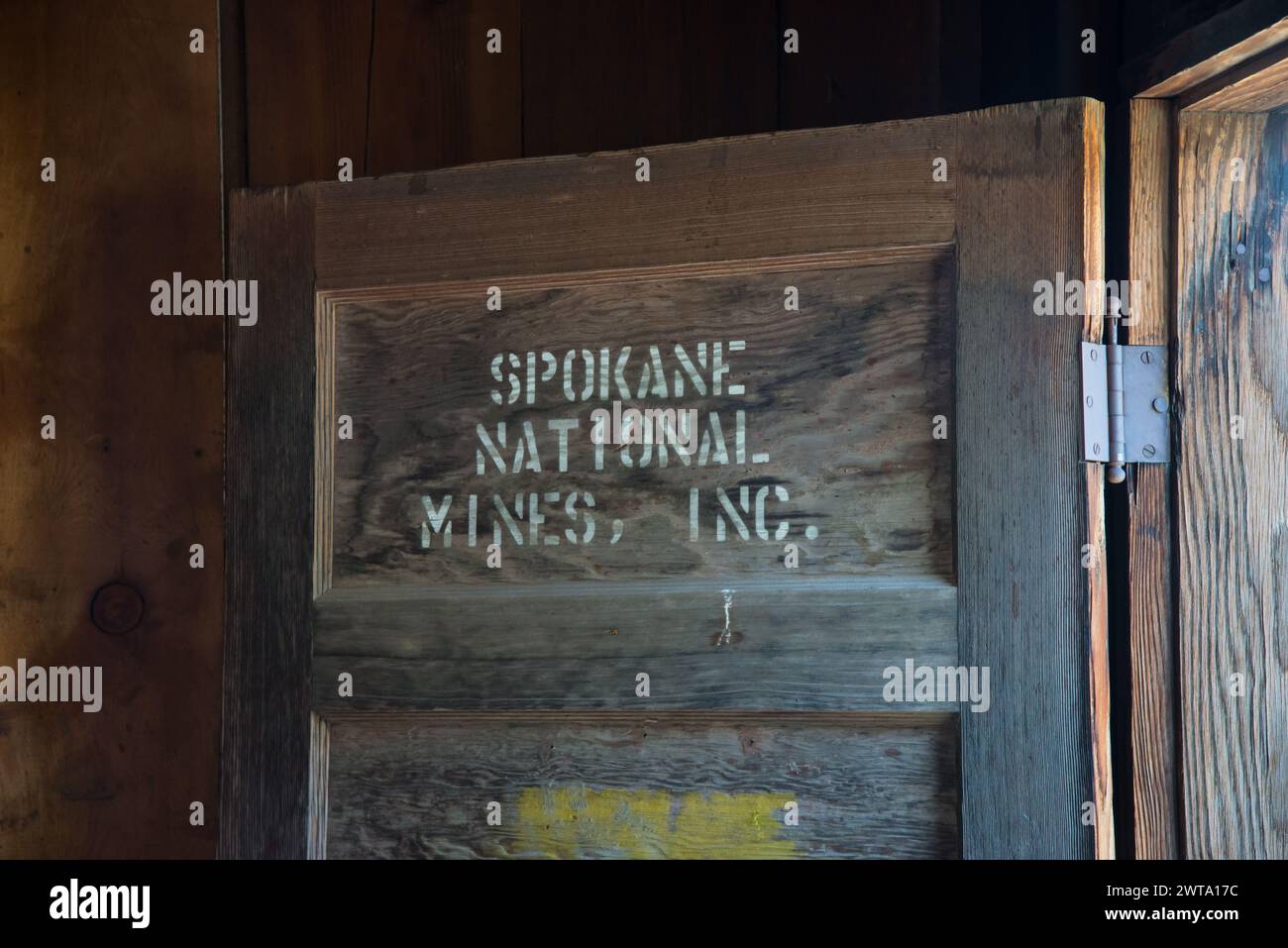 Spokane National Mines door sign in Bannack MT ghost town Stock Photo ...