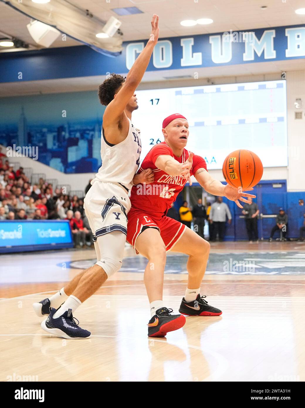 NEW YORK, NY - MARCH 16: Cornell Big Red Guard Isaiah Gray (13) passes ...