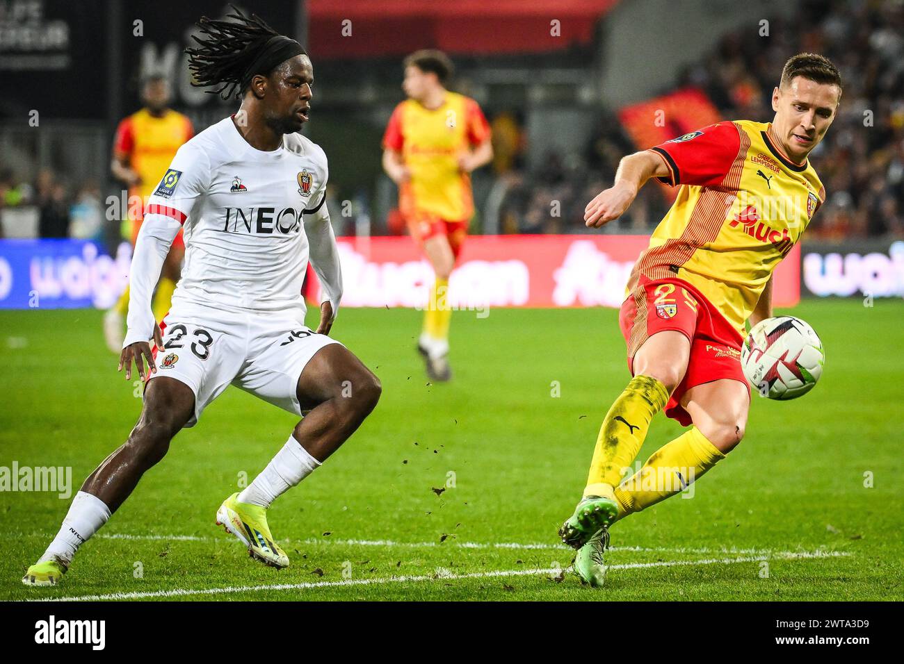 Lens, France. 16th Mar, 2024. Jordan LOTOMBA of Nice and Przemyslaw ...