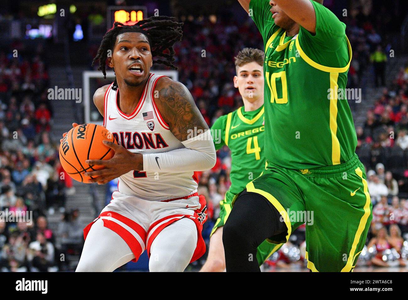 LAS VEGAS, NV - MARCH 15: Arizona Wildcats guard Caleb Love (2) drives ...
