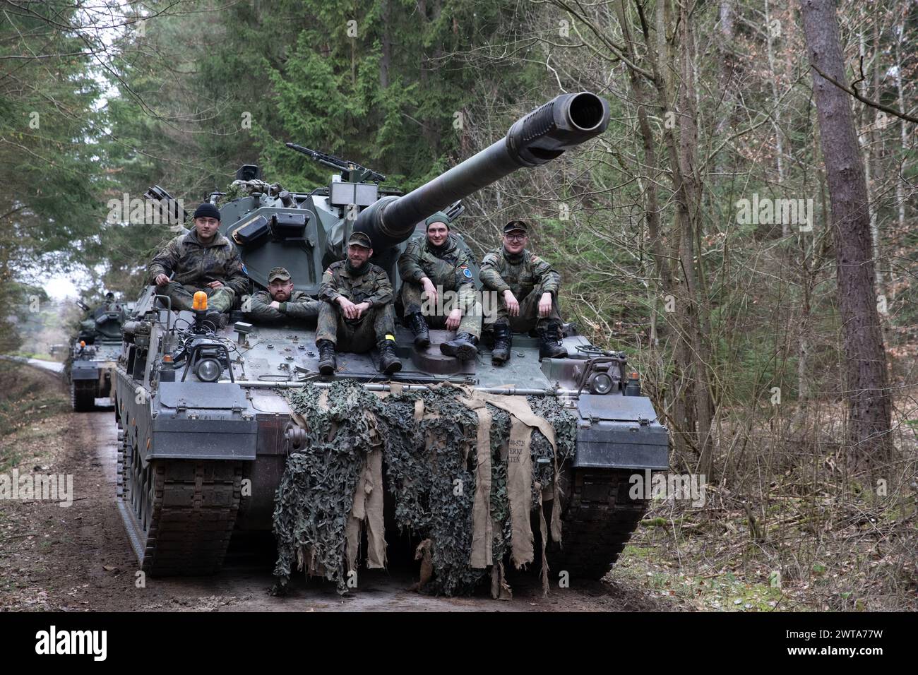 German Army soldiers with the 325th Field Artillery Battalion pose for ...