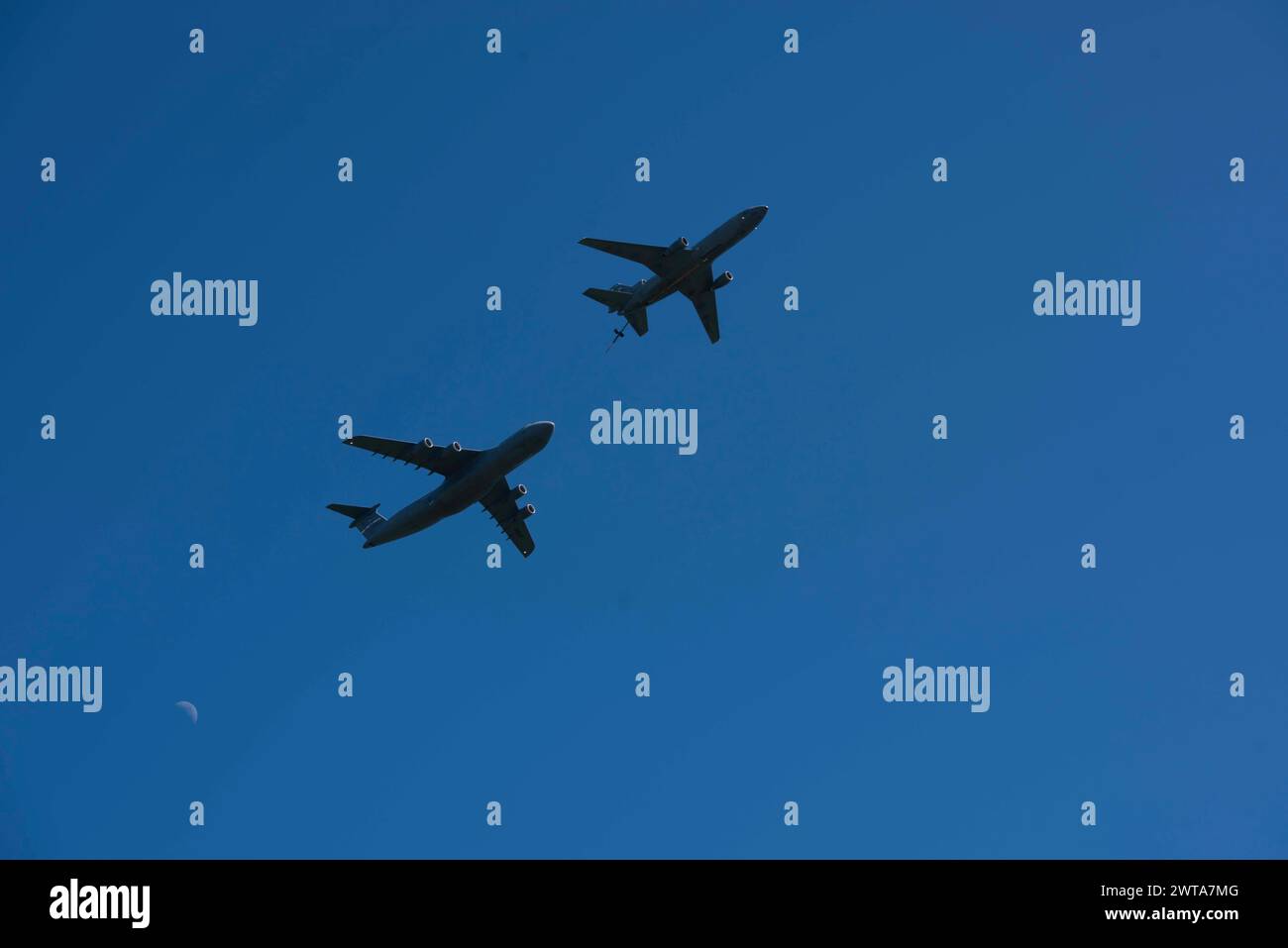 A U.S. Air Force KC-10 Extender and C-5M Super Galaxy perform an air ...