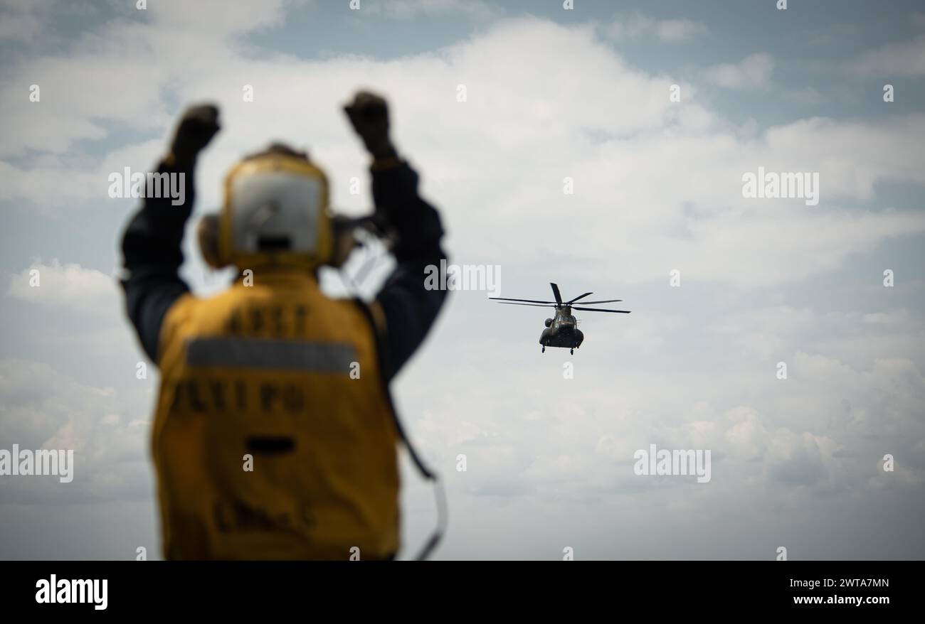 EAST CHINA SEA (Mar. 9, 2024) - A CH-47 Chinook helicopter assigned to ...