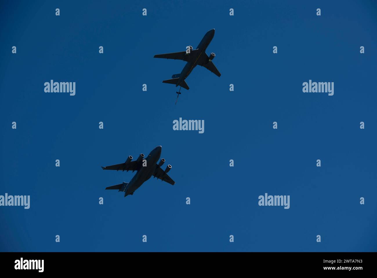 A U.S. Air Force KC-46A Pegasus and C-17 Globemaster III perform an air ...