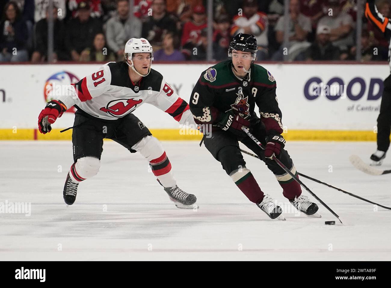 Arizona Coyotes right wing Clayton Keller (9) controls the puck in ...
