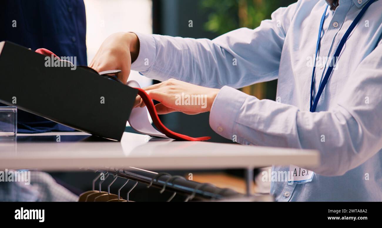 Worker arranging stylish clothes hi-res stock photography and images ...