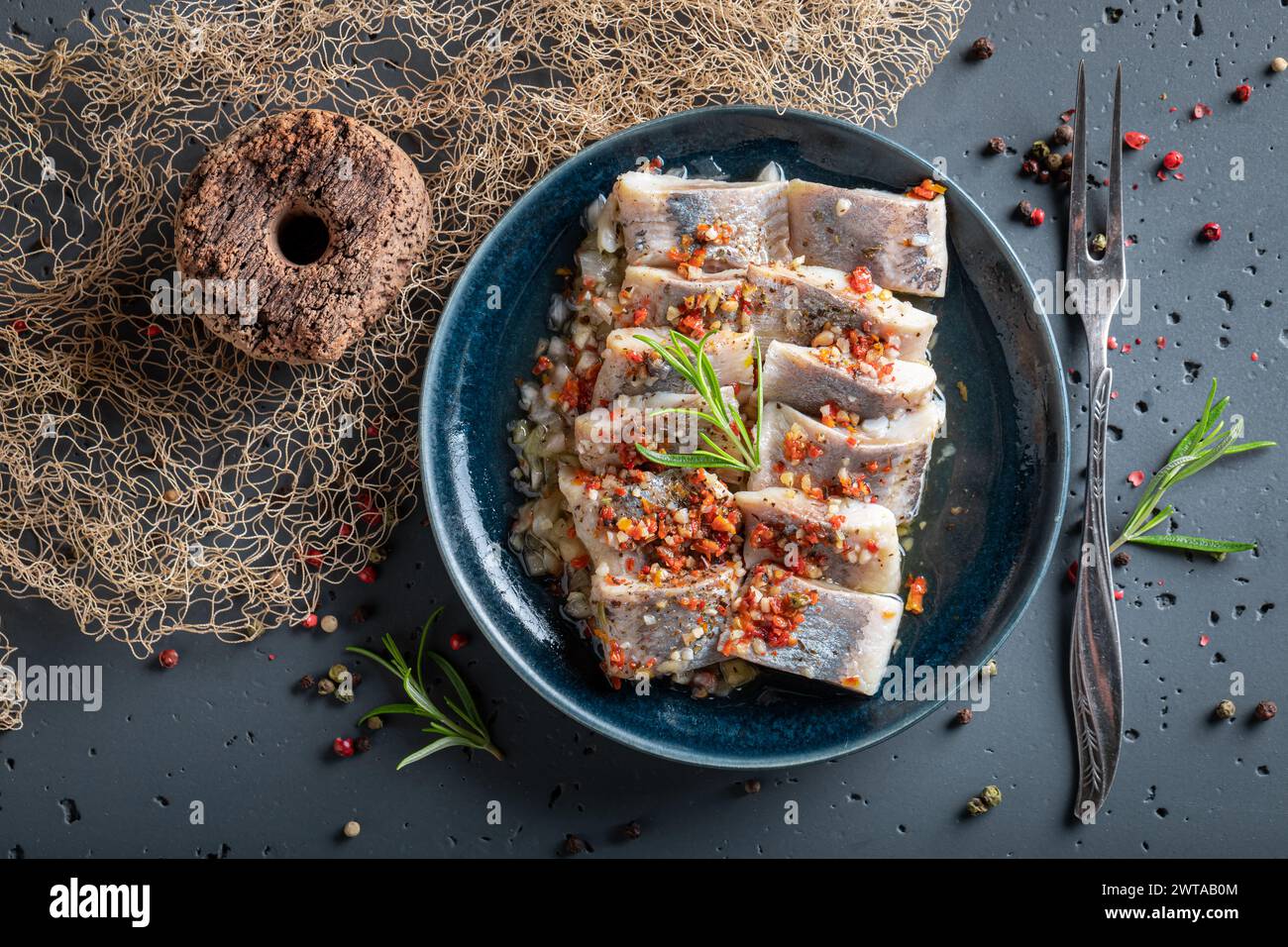 Spicy and sour marinated herring as mediterranean snack. Herring ...