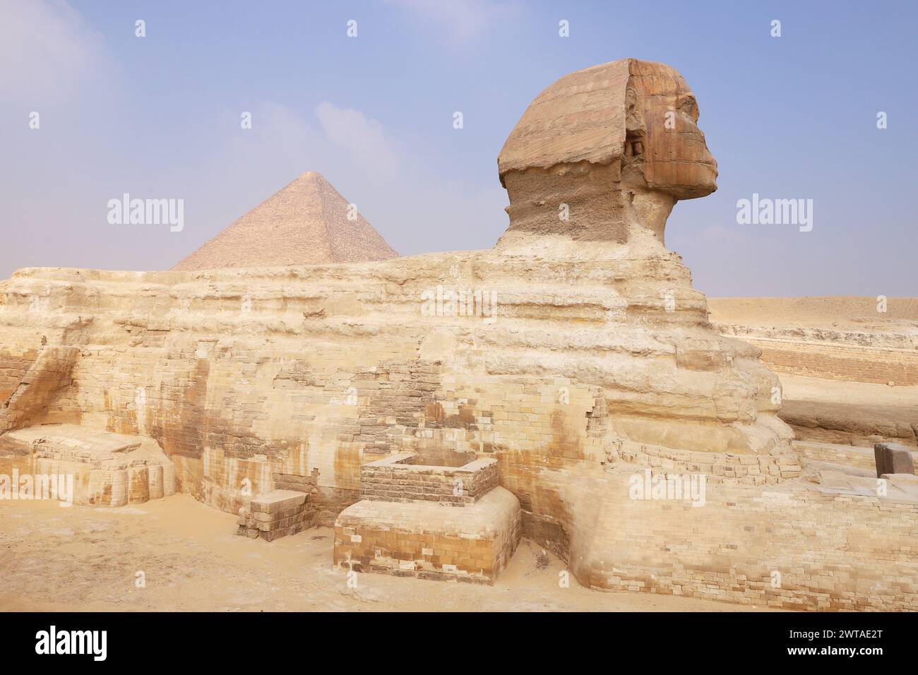 The sphinx with the great pyramid peeking out behind her shoulder. Giza ...
