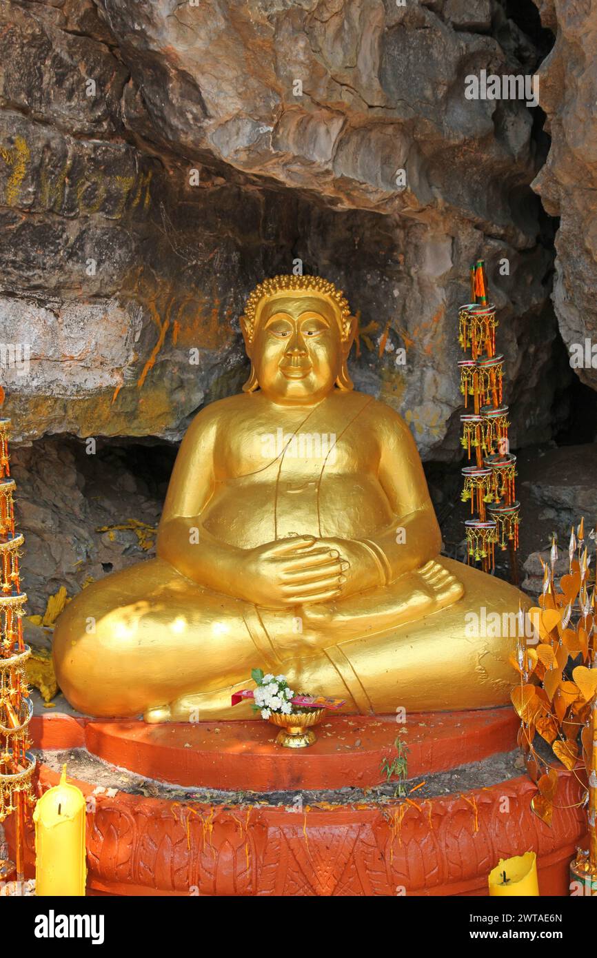 Fat Buddha Statue in Luang Prabang Laos. Buddhism is an integral part of life in UNESCO listed ...