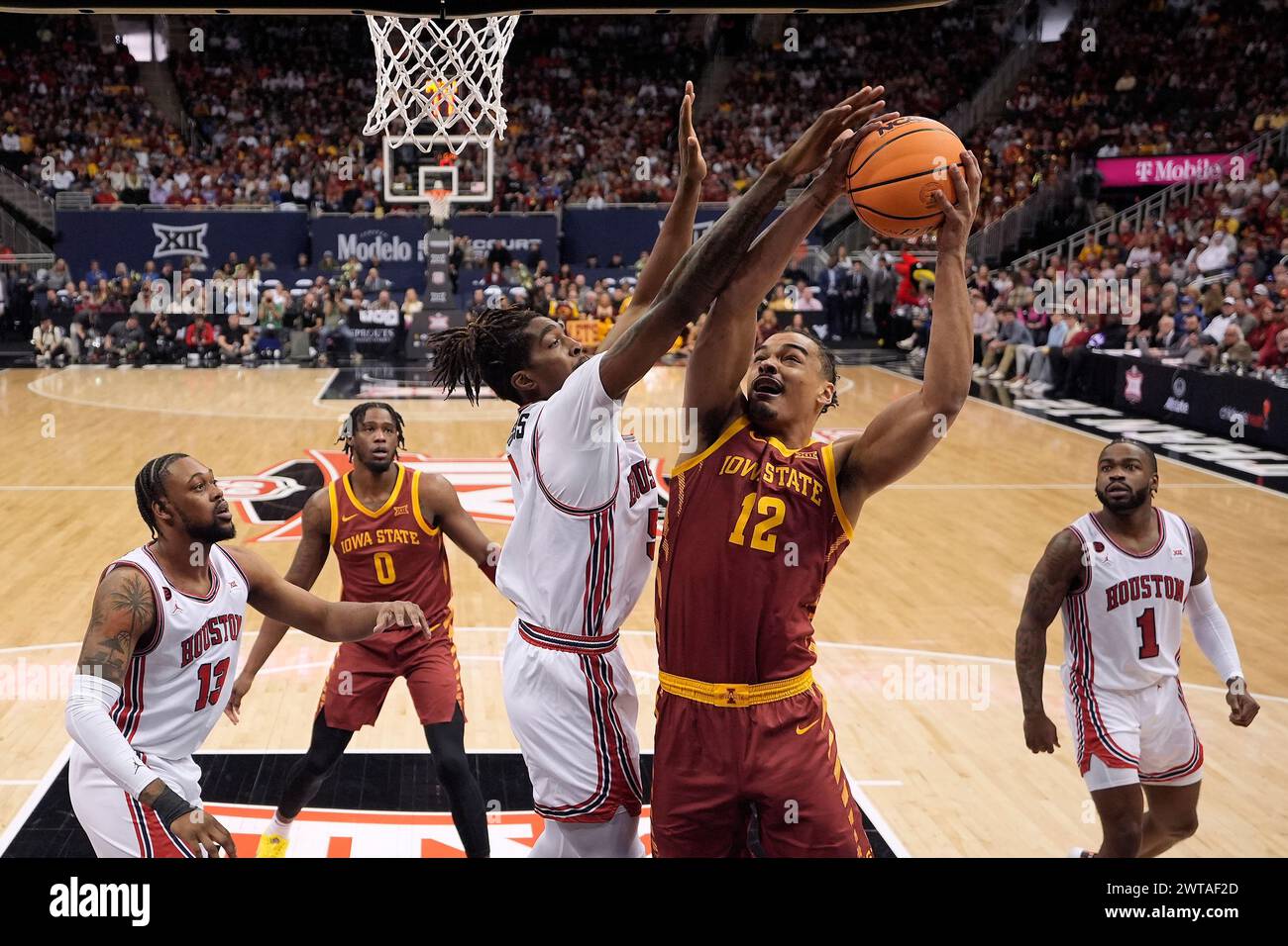 Houston forward Ja'Vier Francis, center left, tries to block a shot by ...