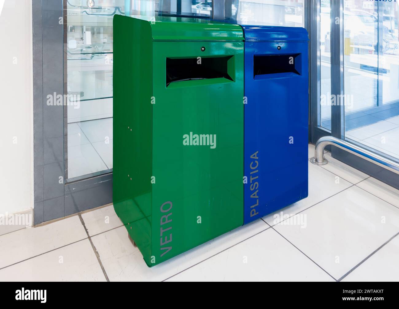 Collection containers for glass waste, green in color, and plastic ...