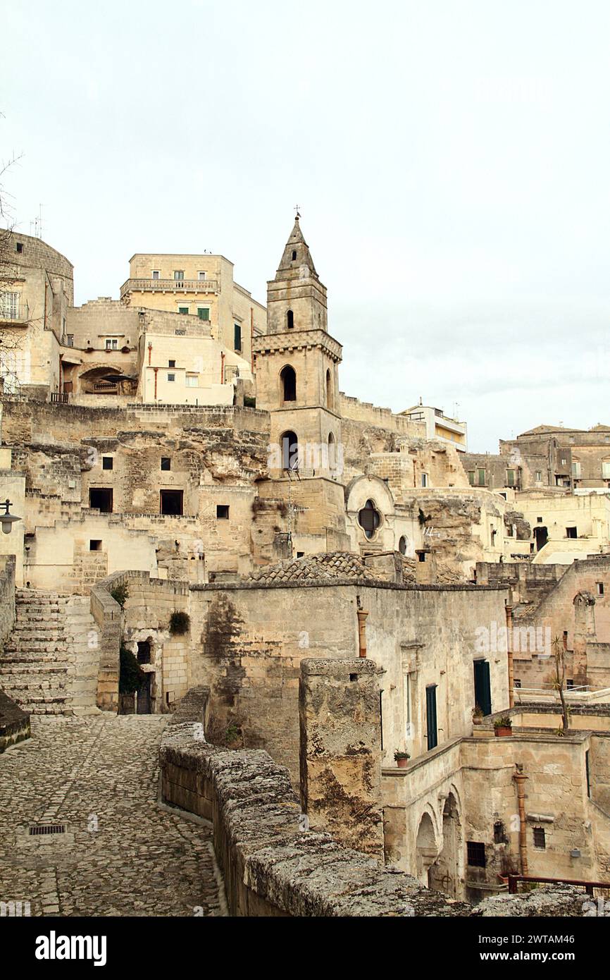 Matera, Italy. Alleyway in the Sasso Barisano area, with the tower of ...